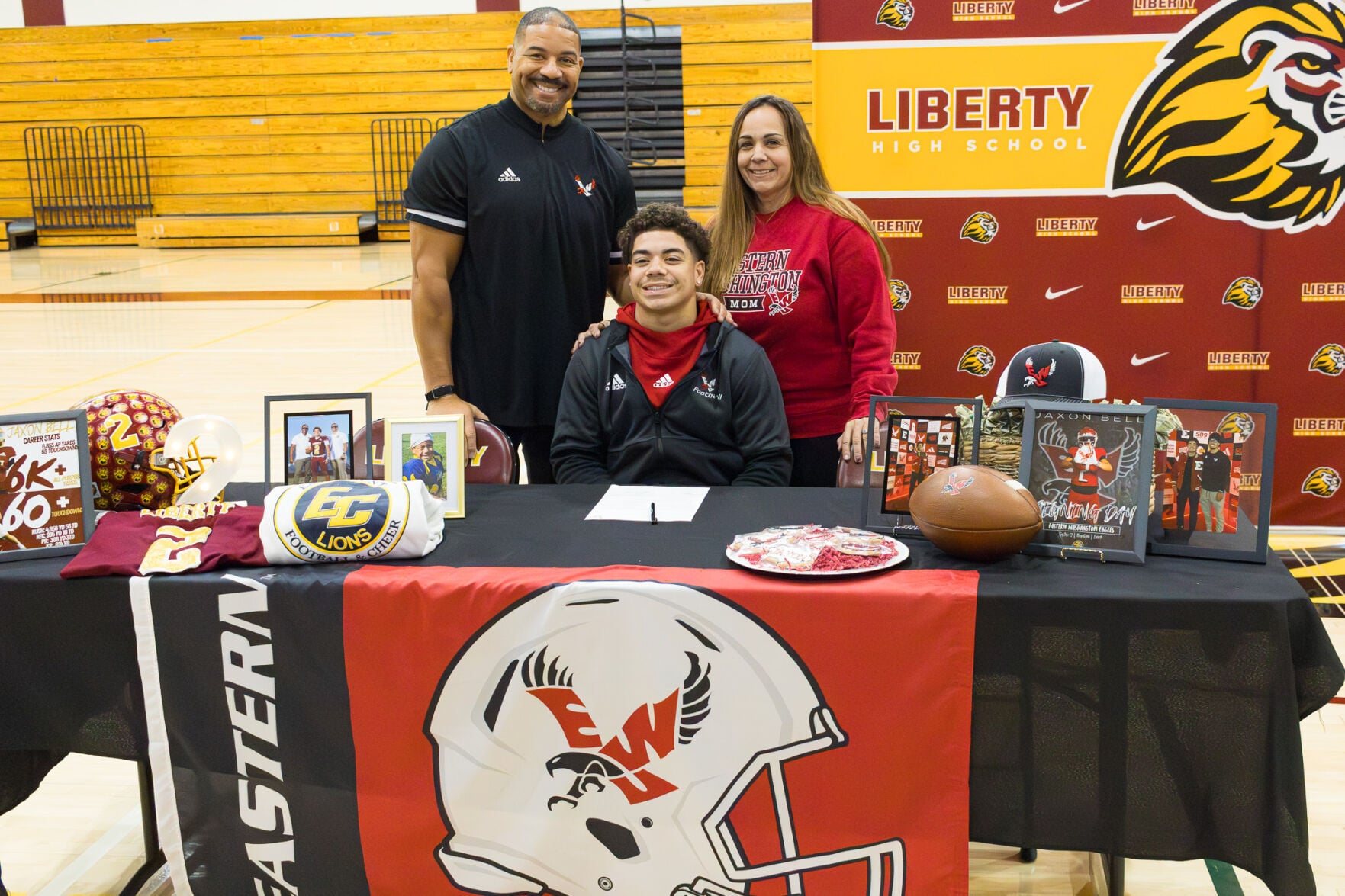 For two Liberty seniors, and their fathers, signing day follows a ...
