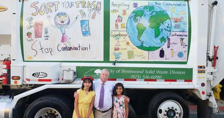 Students turn garbage trucks into art exhibits to raise recycling ...