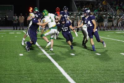 Dogs win Rt. 50 rivalry battle, down Rebels 35-14 | Sports ...