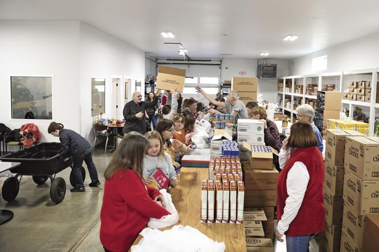 Coffeen Elementary students help with Food Group weekend food bags ...