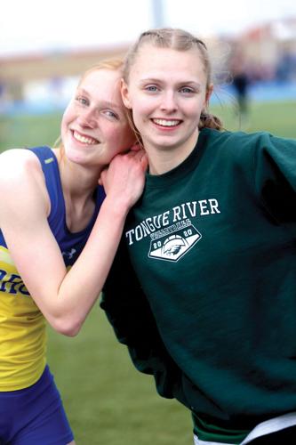 Pendergast siblings run side by side, but with different colored ...