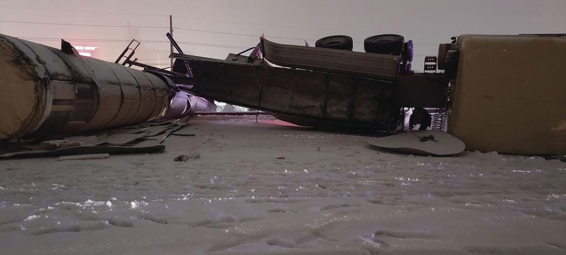 Overturned semi-truck blocks Interstate 90 eastbound, occupants ...