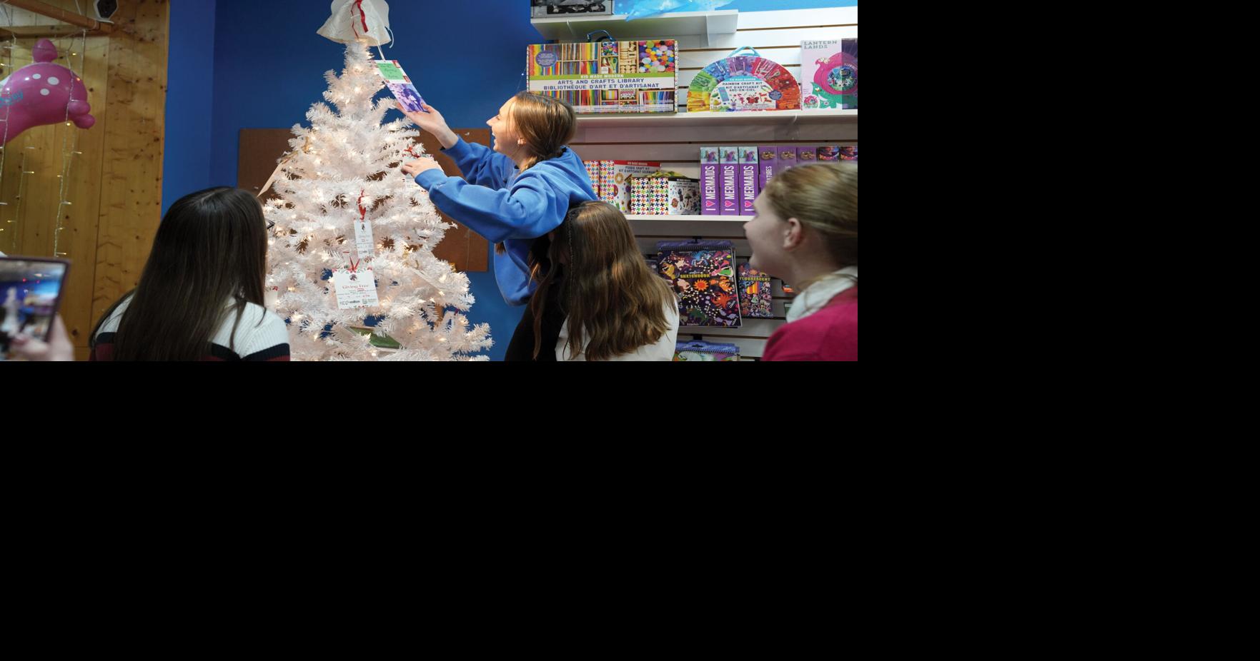 Tree of Compassion now standing in local business | Local News ...