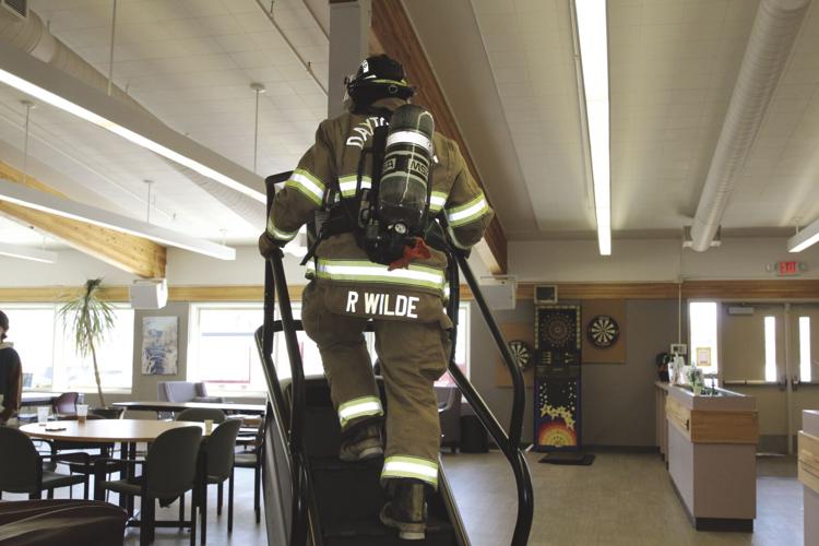 Dayton Volunteer Fire Department cooks pancakes, climbs stairs for a ...