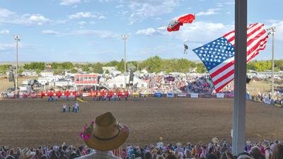 Parachute men: Former SEALS to jump with flag at start of rodeo | Local ...
