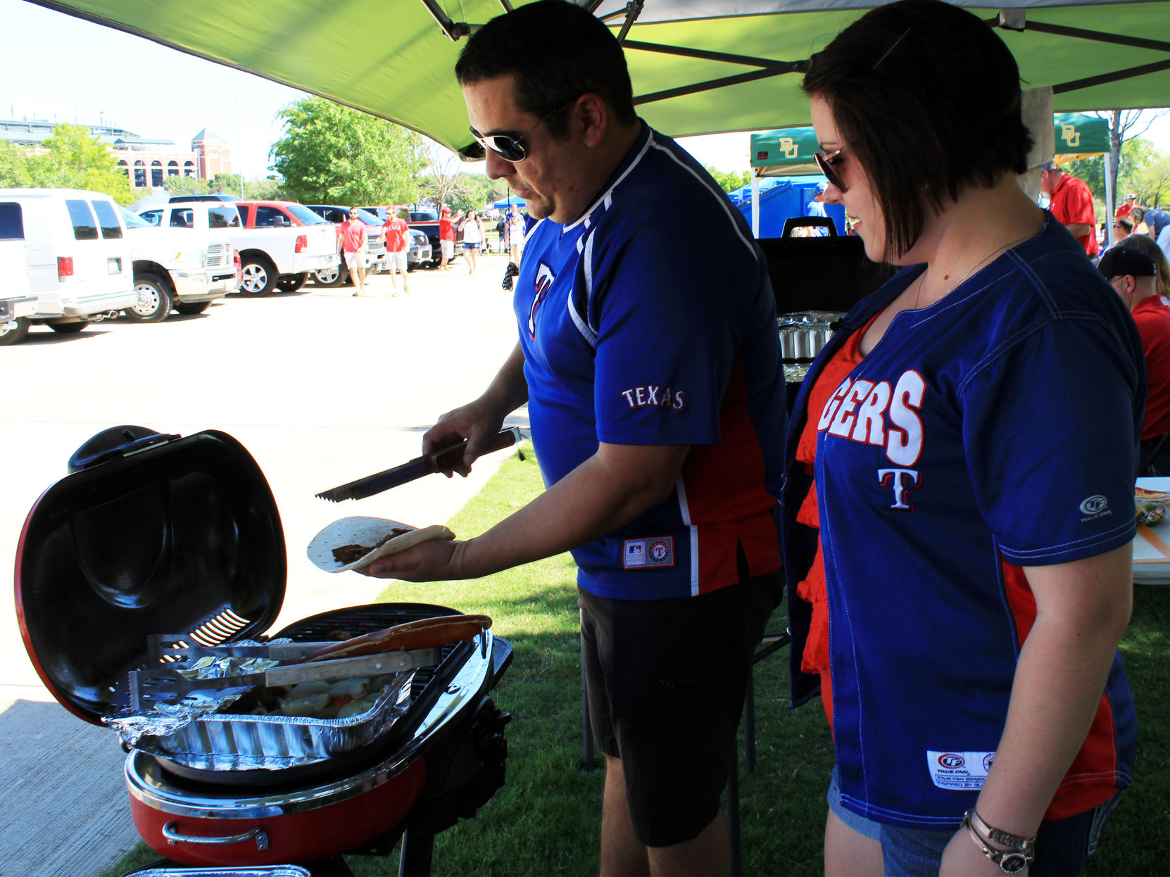 Fans tailgate to celebrate Texas Rangers Opening Day | Multimedia ...