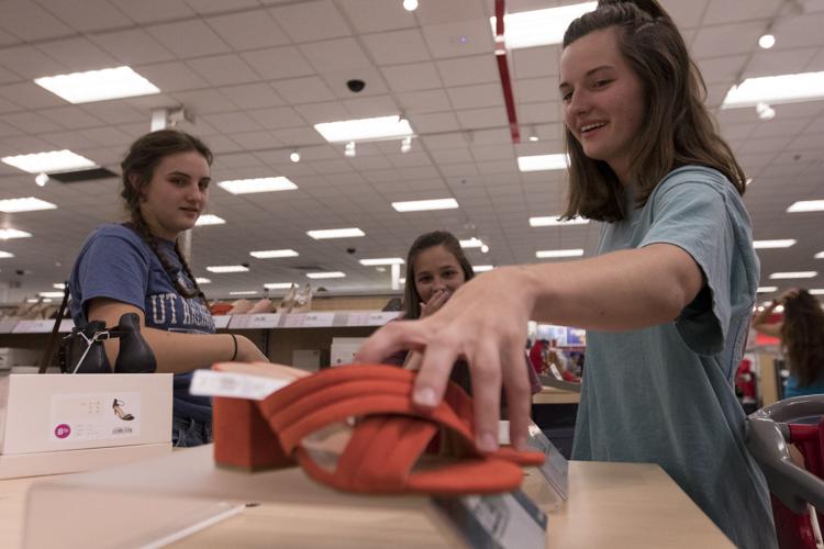 Photos: Students play games, shop deals during Late Night Shopping at ...