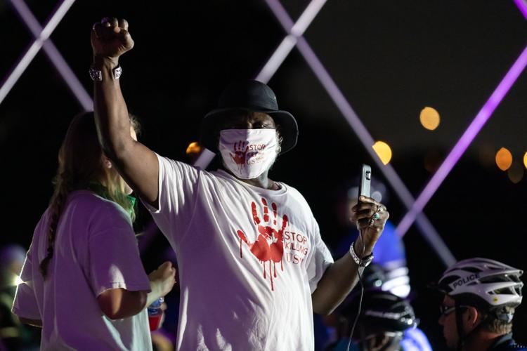 Photos: Demonstrators occupy West Seventh Street bridge during third ...