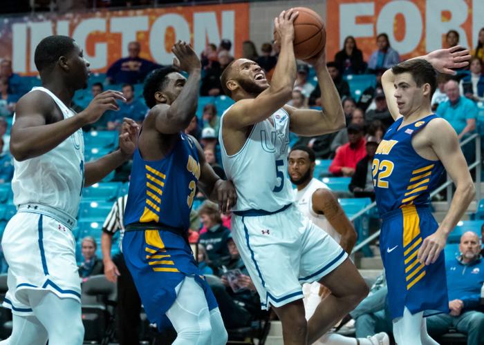 Photos: Thousands of fans cheer as Mavericks seize Homecoming victory ...