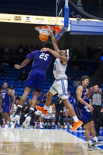 Men’s basketball team slam dunk to victory against Abilene Christian ...
