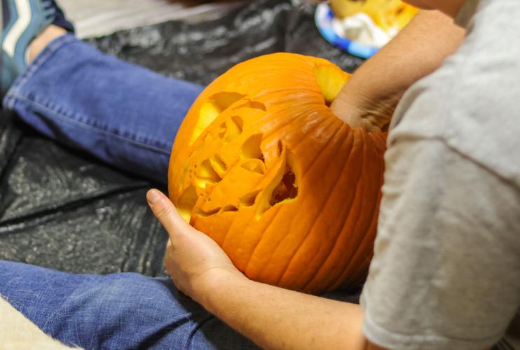 Students welcome spooky season with pumpkin carving contest | News ...