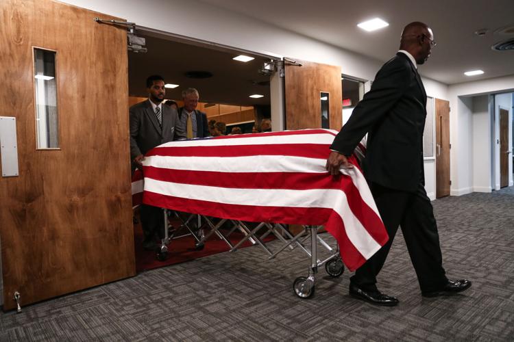 Photos: Community gathers to mourn former UTA President Wendell ...