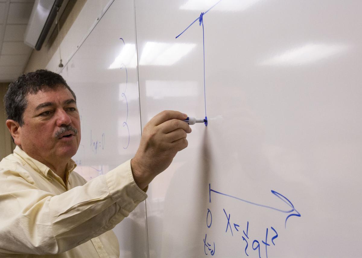Physics professor honored for his commitment to education | News ...