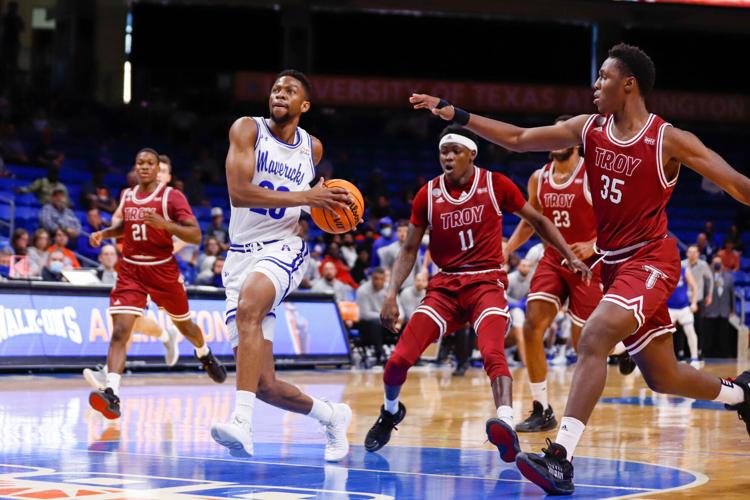 Men’s basketball rings in the new year with win against Troy University ...