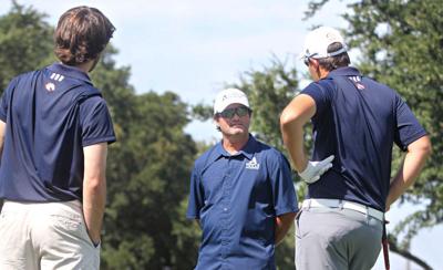 Director, students swing for summer victories | Sports | theshorthorn.com