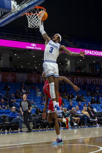 Men’s basketball clinches conference tournament berth with win over ...