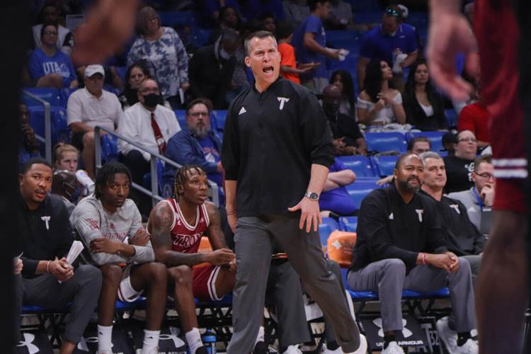 Men’s basketball rings in the new year with win against Troy University ...