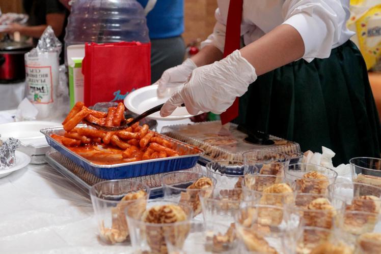 Photos: Food fair serves up international flavors | Multimedia ...