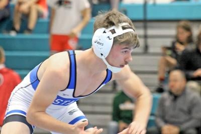 McCoy, Wilson win tourney, team places second; SM women have first dual ...