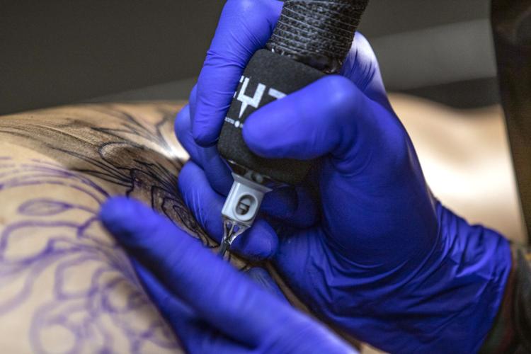 Being homesick led Carl Prust to tattooing | Life & Arts ...