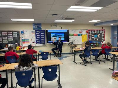 Reading with State Rep. Greg Howard at the West Vine School | Front ...
