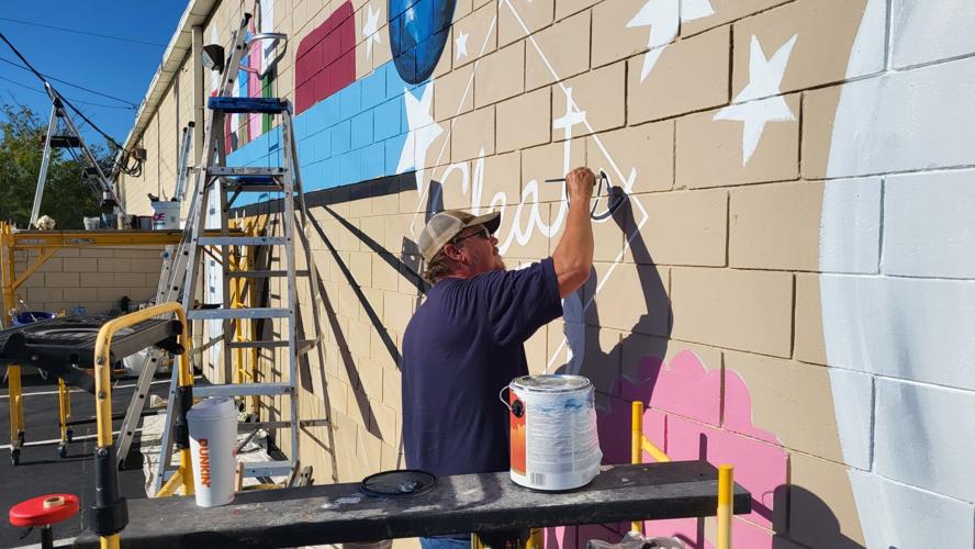 Mural men: Father-son duo enlivens Alley Katz wall with art | Daily ...
