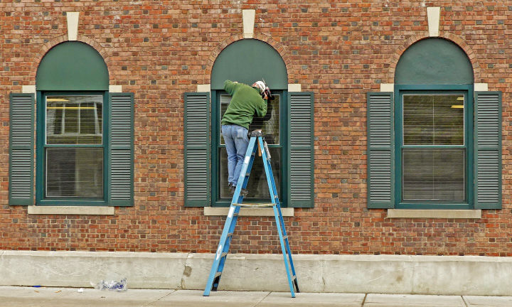 PHOTOS: The George C. Moore Co. building gets new windows | News ...