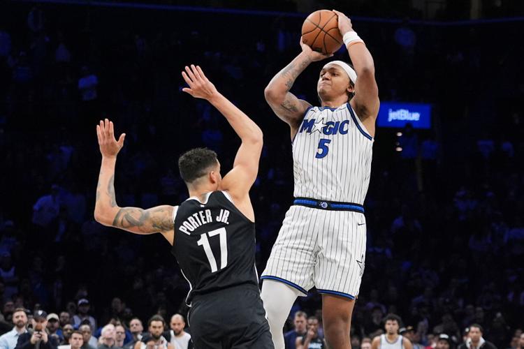 Banchero banks in 3-pointer at OT buzzer to lift Magic past Nets, 104 ...