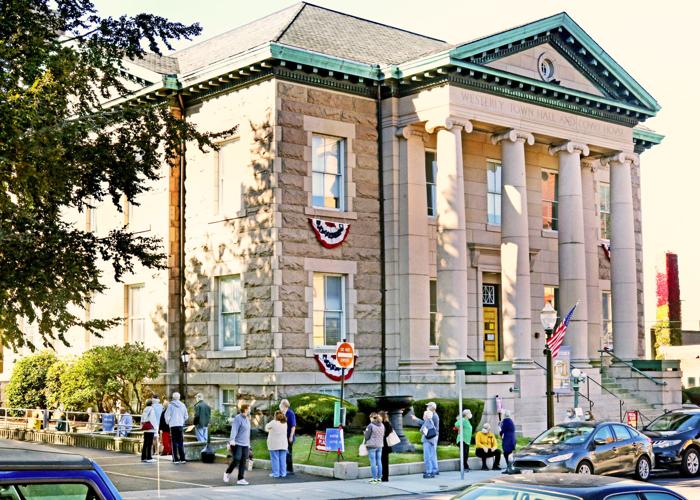 PHOTOS: Early in-person voting begins with a long line at Westerly Town ...