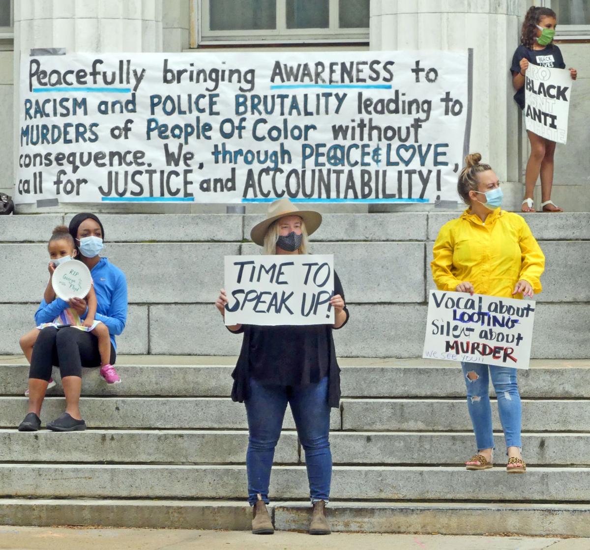 PHOTOS: Protesters demonstrate against racism, police brutality on ...