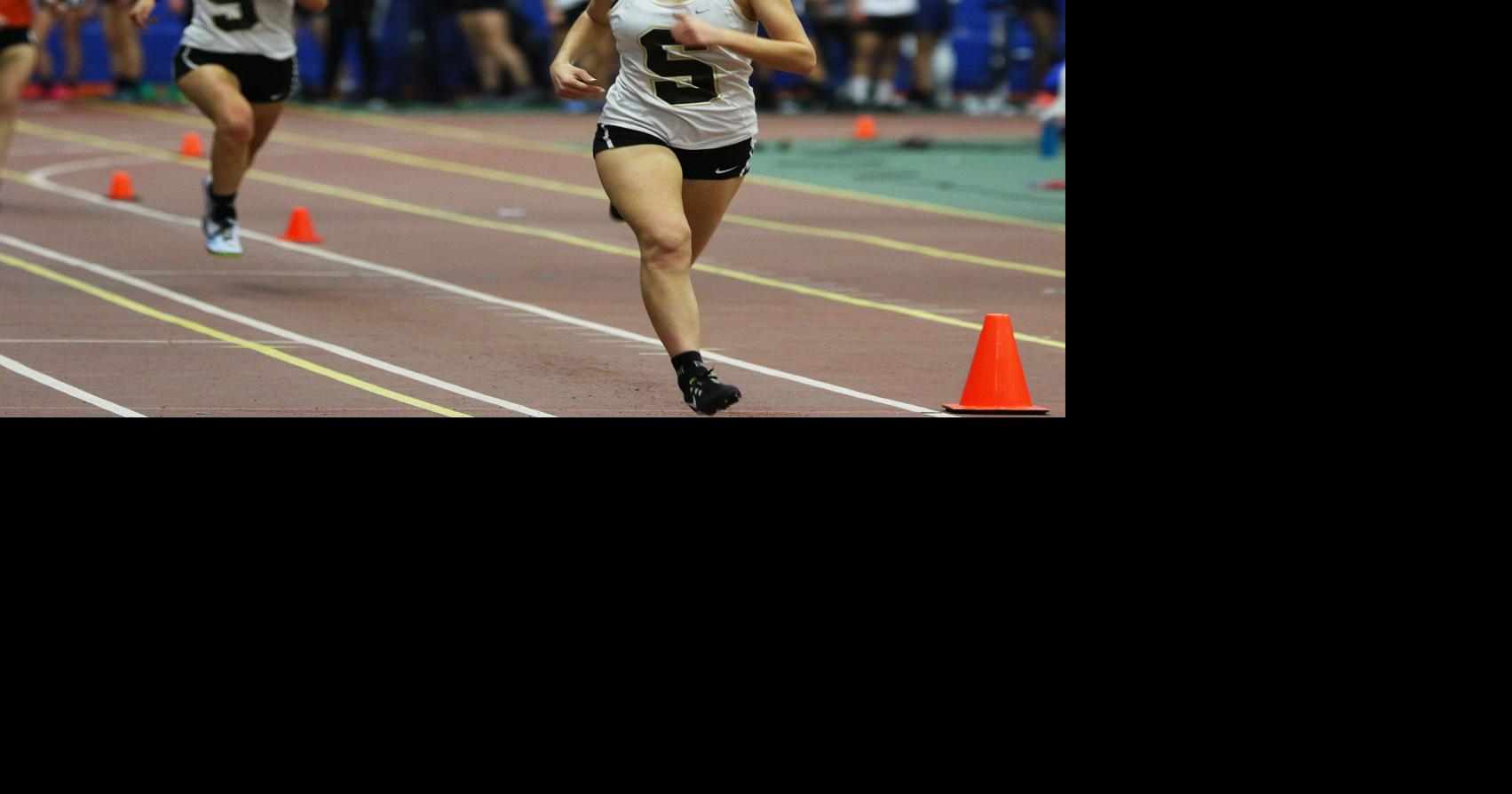 Stonington’s Megan Detwiler competing in the girl’s 600 meter run at ...