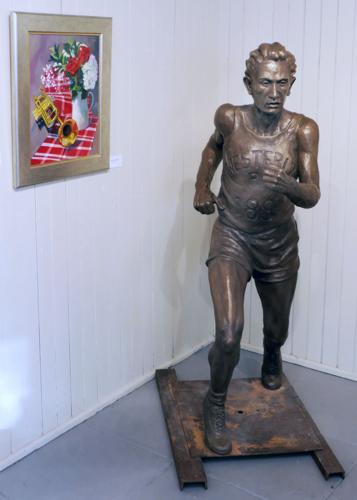 Bronze statue of running legend Tarzan Brown arrives safely to its ...
