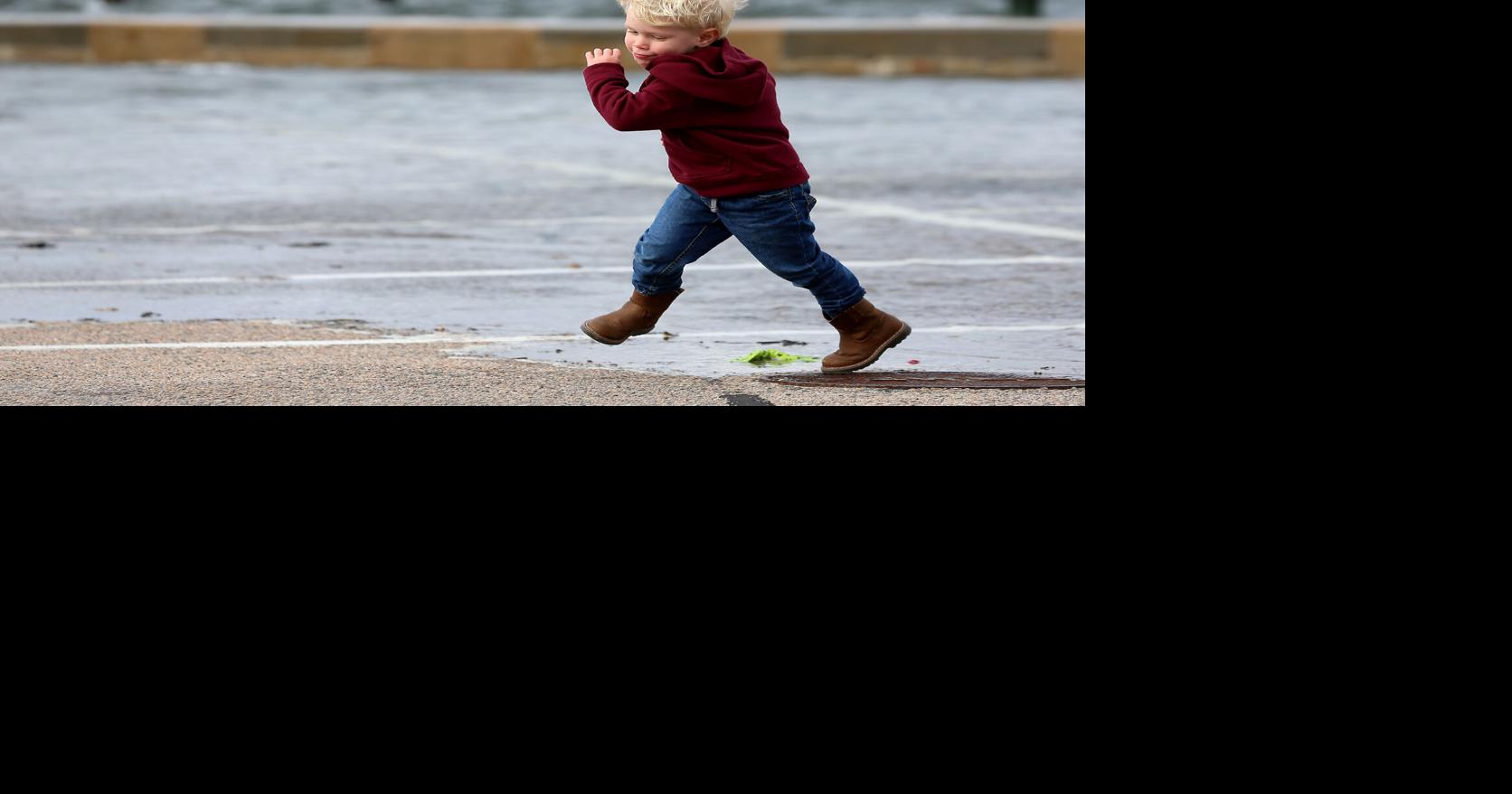 PHOTOS: Having fun in the puddles | Westerly | thewesterlysun.com