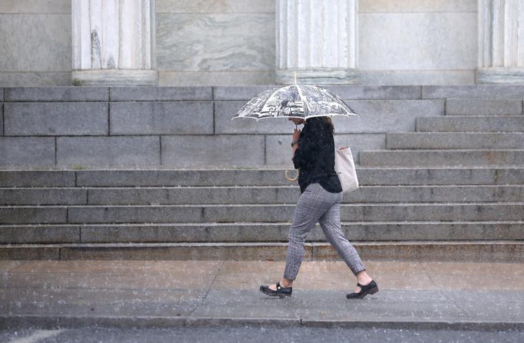 PHOTOS: People getting drenched in torrential rain | Westerly ...