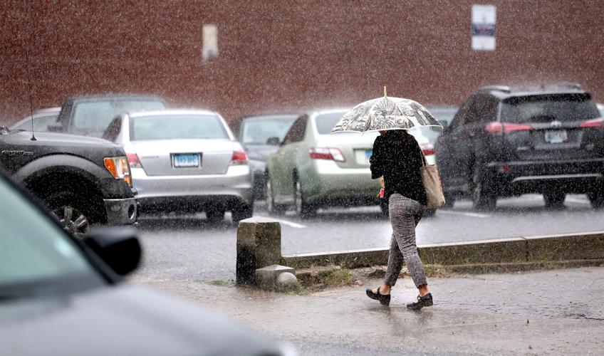 PHOTOS: People getting drenched in torrential rain | Westerly ...