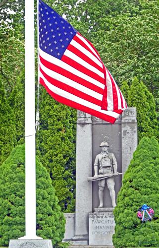 PHOTOS: Flag at half-staff at Pawcatuck World War I Memorial ...