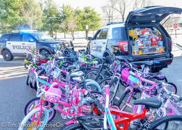 PHOTOS: Stonington Police stuff a cruiser full of toys, canned goods ...