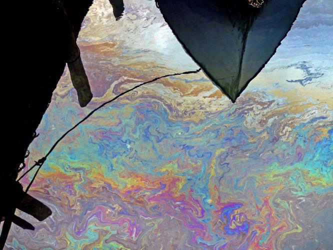 PHOTOS: Oil colors paint the waves near the Stonington Town Dock ...