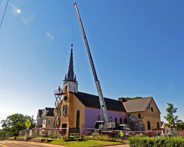 PHOTOS: Rebuilding of St. Michael Church hits milestone with placing of ...