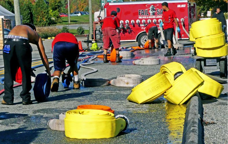 PHOTOS: Testing a tangle of fire hoses | News | thewesterlysun.com