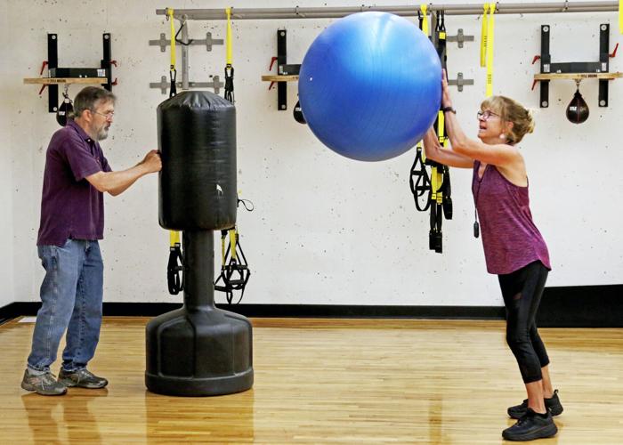 Pummeling Parkinson's: Members of Y group form tight bond as they seek ...