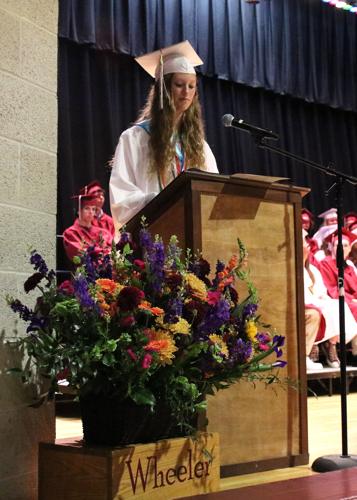 Threat of rain moves graduation indoors, but it can't dampen spirits of ...