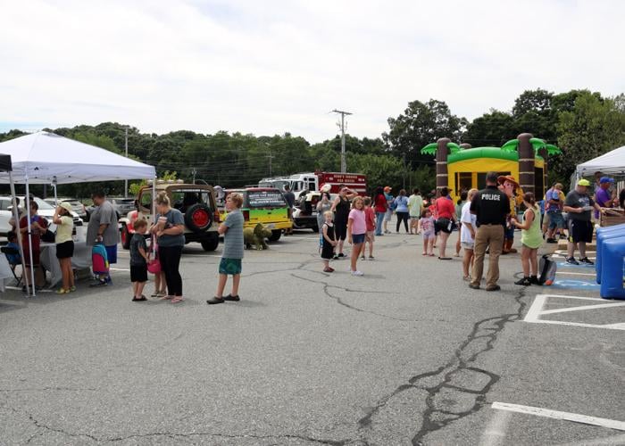 PHOTOS: Backpack giveaway at Wireless Zone in Dunn's Corners fun for ...