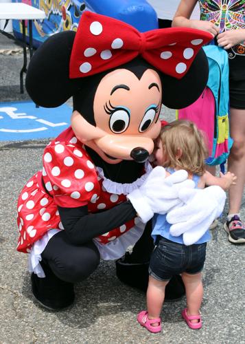 PHOTOS: Backpack giveaway at Wireless Zone in Dunn's Corners fun for ...