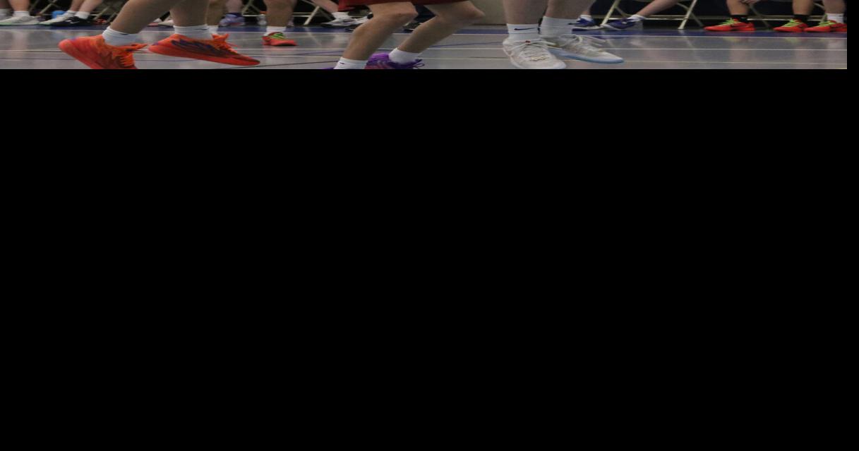 Dan Cummings (12) lays one up for Westerly while Cole’s Jake Stanger (3 ...