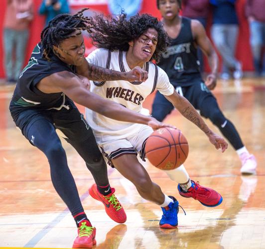 Boys basketball: Storybook run ends for Wheeler in Division IV ...