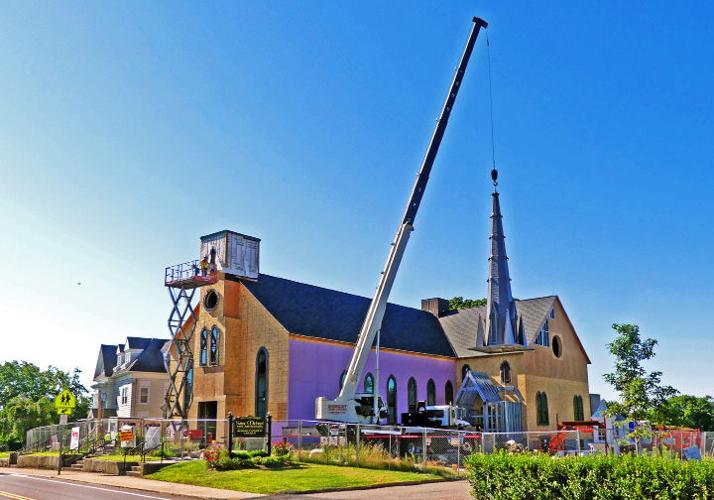 PHOTOS: Rebuilding of St. Michael Church hits milestone with placing of ...