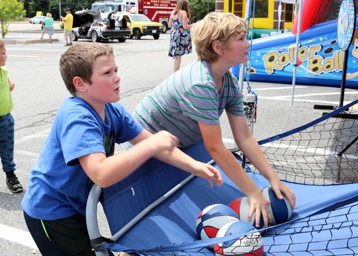 PHOTOS: Backpack giveaway at Wireless Zone in Dunn's Corners fun for ...