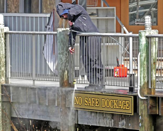 PHOTOS: Power washing the deck at the Bridge restaurant | Westerly ...