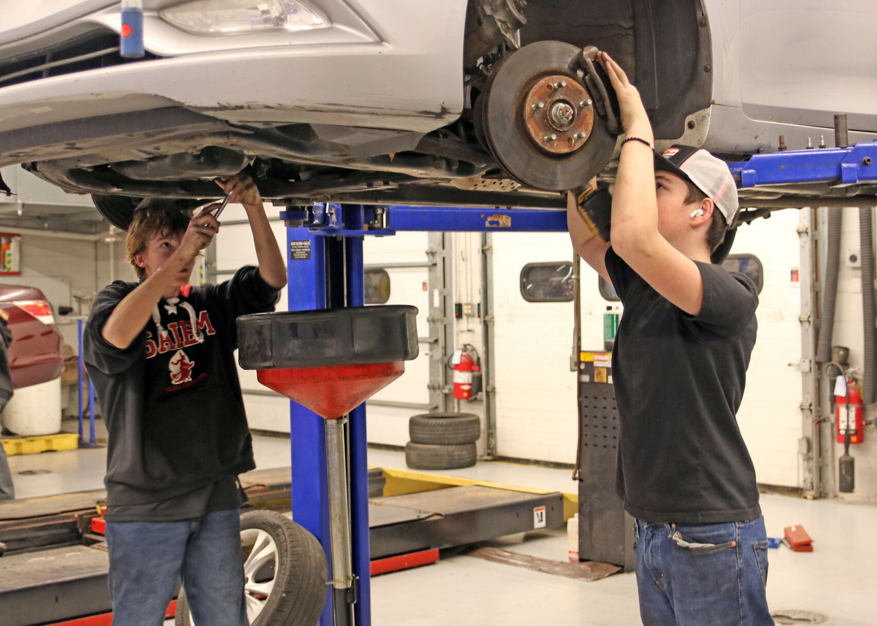 Two freshmen students, and future auto mechanics, sees Tim Sears ...